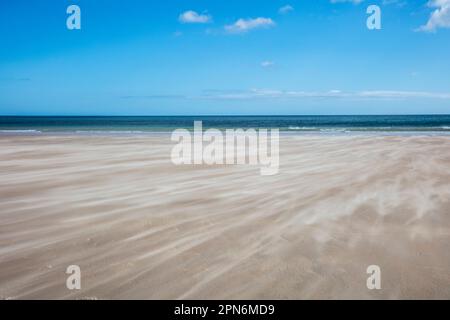Strong winds blowing sand around on the Beach Stock Photo - Alamy