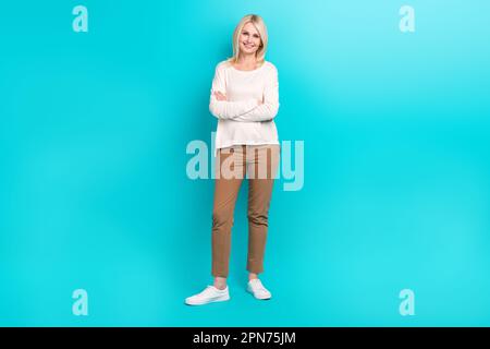Full length photo of pretty shiny woman dressed orange rising bargains ...
