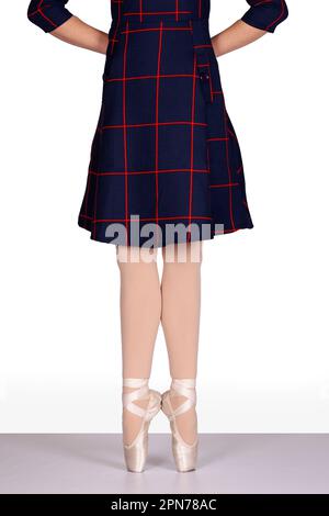 En Pointe CORRECT feet together from above Close up of young female ...