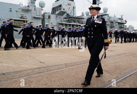 Commanding officer Commander Claire Thompson (right) hands over the ...