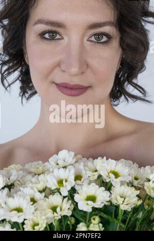 Close up portrait of a natural mixed race woman with curly hair Stock ...