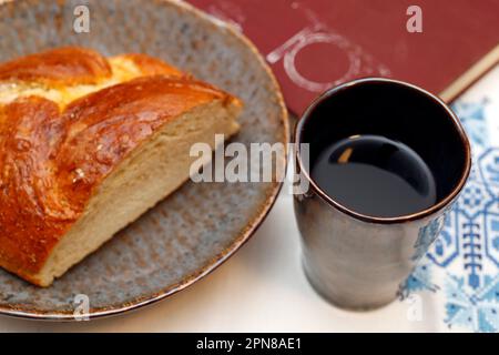 Protestant church. Bible, vine and bread on altar. Communion in memory ...