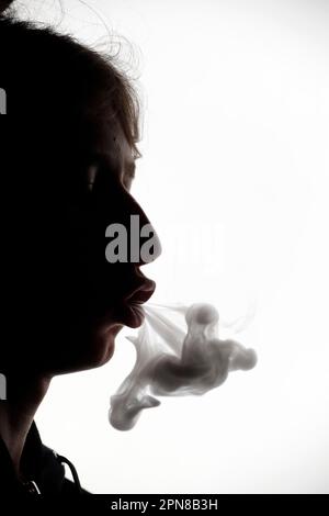 Profile Silhouette of a Man Smoking on White Background Stock Photo - Alamy