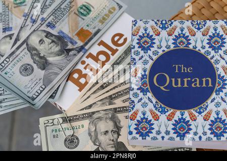 Money, religion and interfaith. Banknotes of US dollars with wooden ...
