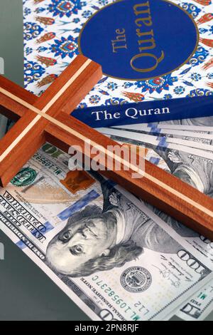Money, religion and interfaith. Banknotes of US dollars with wooden ...