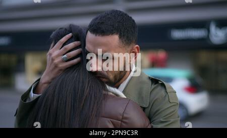 Couple embrace in empathy calming partner during difficult times. A ...