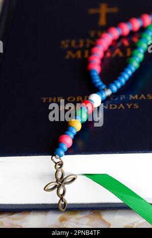 Sunday missal with christian cross Stock Photo - Alamy
