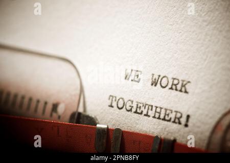 We work together text written with a typewriter Stock Photo - Alamy