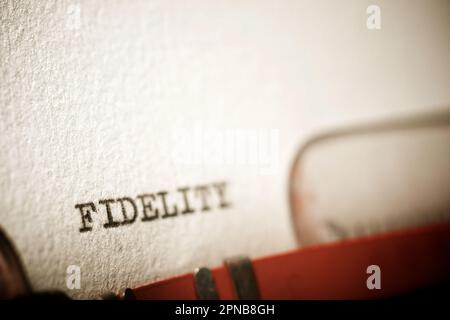 Fidelity word written with a typewriter Stock Photo - Alamy