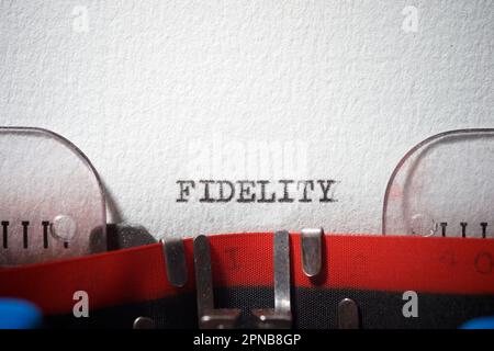 Fidelity word written with a typewriter Stock Photo - Alamy