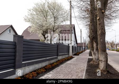 Bucha, Ukraine. 17th Apr, 2023. Renovated residential houses, fences ...