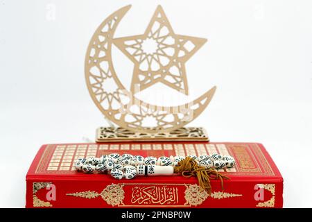 Holy Quran ( Kuran ) and Crescent and Star, symbols of Islamic faith ...