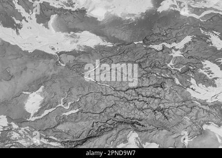 The structure of cracked wet earth at the bottom of the lake, creating ...