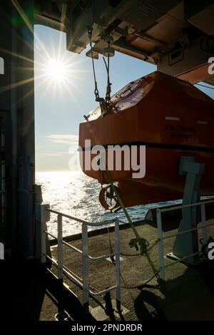 Self-righting lifeboat onboard a ship at sea Stock Photo - Alamy