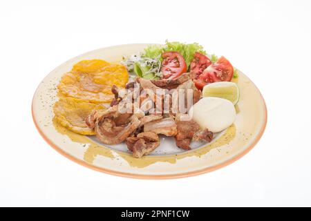 Colombian Food, Fried Chicharron Accompanied By Salad, Patacon, And ...
