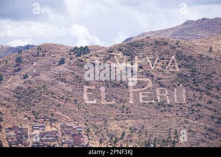 Viva El Peru writing at Andes mountain Cusco Peru. Viva el Peru means ...