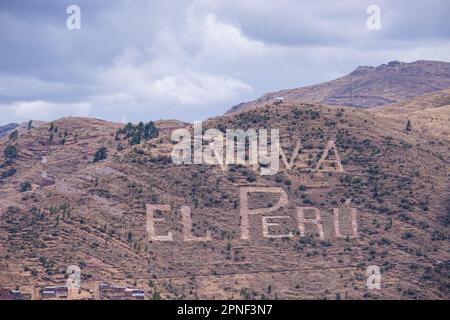 Viva El Peru writing at Andes mountain Cusco Peru. Viva el Peru means ...