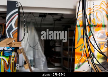 Demolished structure with graffiti and neglected debris, empty deserted ...