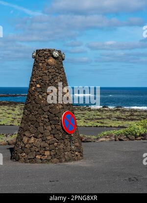 Traffic Signs On A Stone Pillar, Lanzarote, Canary Islands, Spain Stock ...
