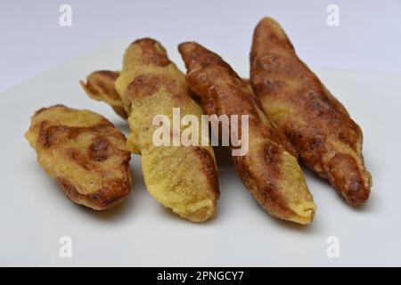 Deep fried extremely tasty Sri Lankan sweet snacks called Athirasa, the ...