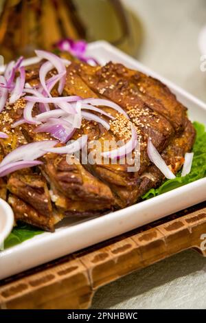 A delicious Chinese Xinjiang dish, grilled lamb chops Stock Photo - Alamy