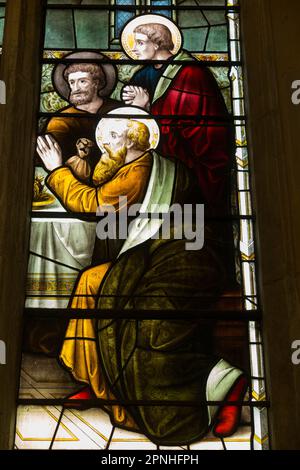 Apostles, including Judas with money bag containing silver pieces and ...