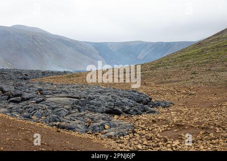 Black solidified lava of Fagradalsfjall volcano in a foggy day Stock ...