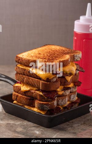 Grilled cheese on small pan Stock Photo - Alamy