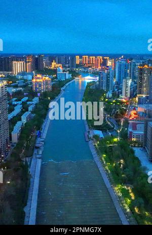 KORLA, CHINA - APRIL 19, 2023 - Night view of Korla city after rain in ...