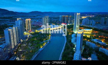 KORLA, CHINA - APRIL 19, 2023 - Night view of Korla city after rain in ...