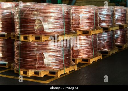 Rows of copper wire rod coils in production plant warehouse Stock Photo ...