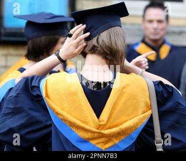 Anglia Ruskin University students in their academic colourful gowns and ...