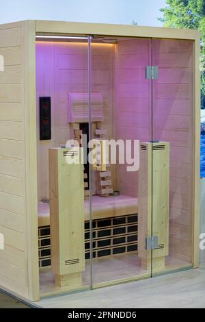 Infrared cabin made of wood and light color Stock Photo - Alamy