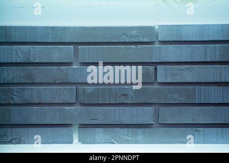 Fragment of gray brickwork. Neat brickwork Stock Photo - Alamy