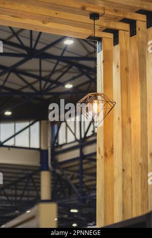 Loft-style construction. Wooden beams and wall Stock Photo - Alamy