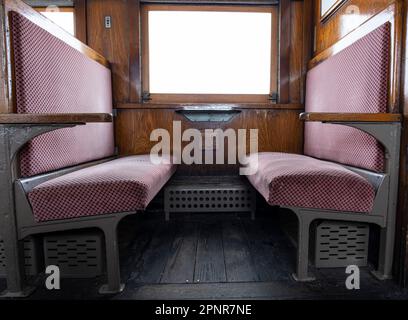 Old train car with wooden seats in the Basque Railway Museum one of the ...