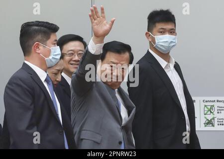 Accompanied by Chief Executive John Lee Ka-chiu, Xia Baolong, director ...