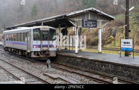 A JR West KiHa 120 Series one man train at Bingo-Ochiai Station in ...