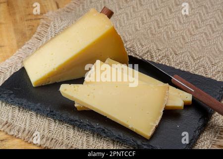 Swiss cheese collection, gruyere cheese made from unpasteurized cow's ...