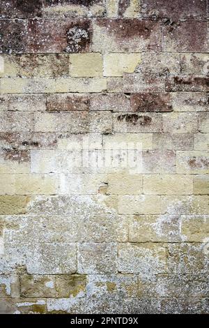 Old weathered and discoloured limestone block wall Stock Photo - Alamy