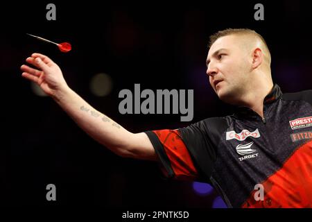 Nathan Aspinall in action during his third round match against Andrew ...