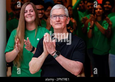 Apple CEO Tim Cook greets former President Barack Obama after the 60th ...