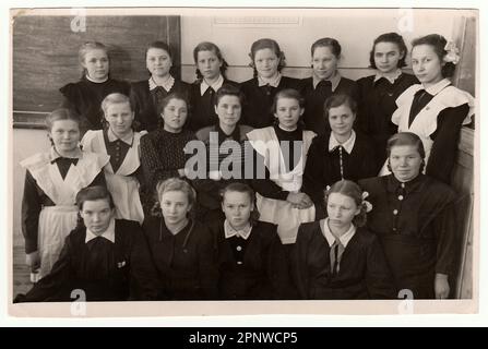 USSR - CIRCA 1950S: Vintage photo shows schoolmates at school desks ...