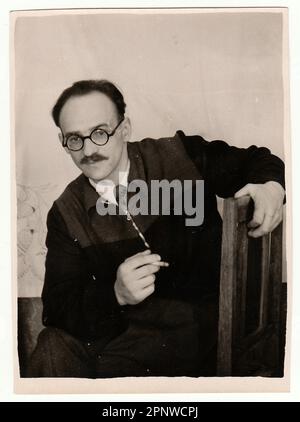 The young man with moustache isolated on white Stock Photo - Alamy