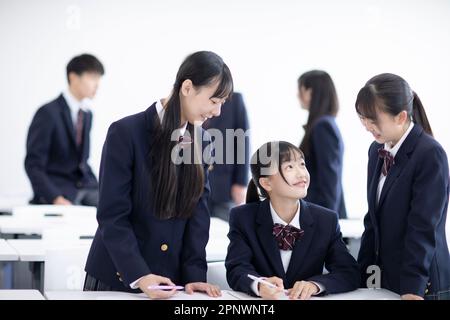 High school boys spending recess in a classroom Stock Photo - Alamy