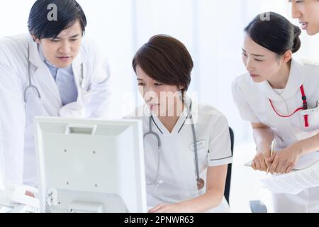 Doctor and nurse watching the monitor Stock Photo - Alamy