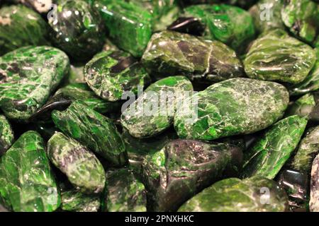 chrome diopside gems as natural mineral background Stock Photo - Alamy
