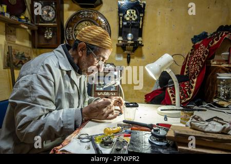 Watchmaker fixing the mechanism of a watch Stock Photo - Alamy