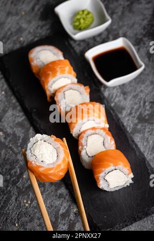 Chopsticks holding shrimp, tuna, salmon cubes. Hand-painted watercolor ...