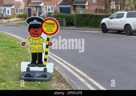 Amusing sign outside a school with a policeman and lollipop sign ...